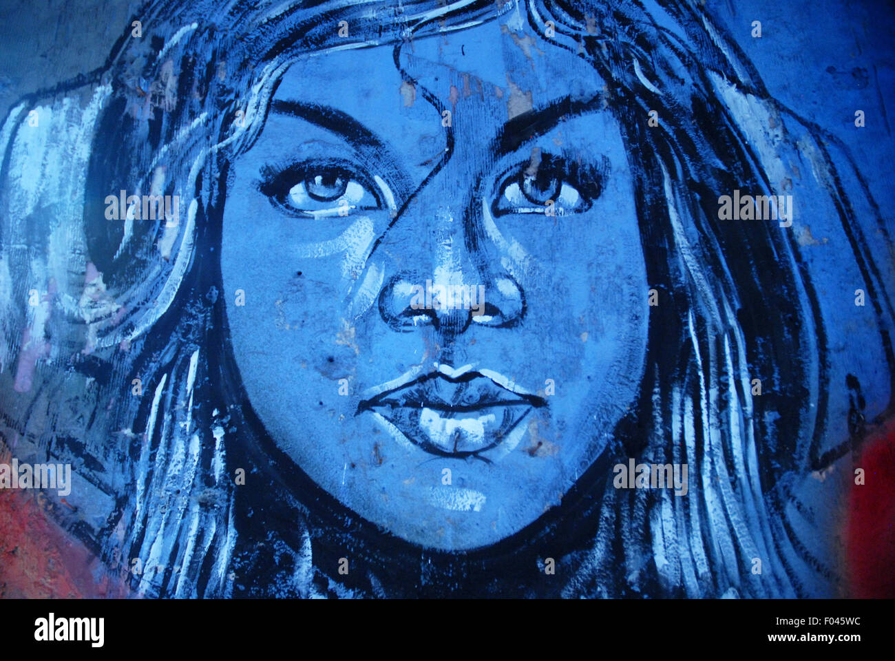 Painted face of blue lady, Mumbai, India Stock Photo - Alamy