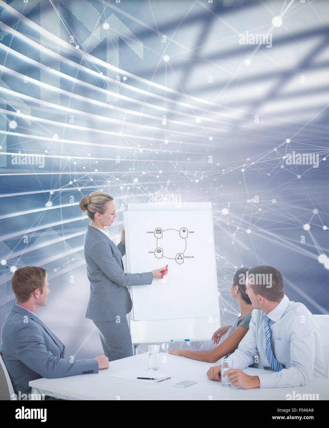 Composite image of manager presenting whiteboard to his colleagues ...