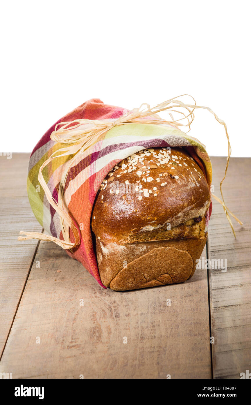 Loaf of artisan whole wheat bread with cloth wrap Stock Photo - Alamy