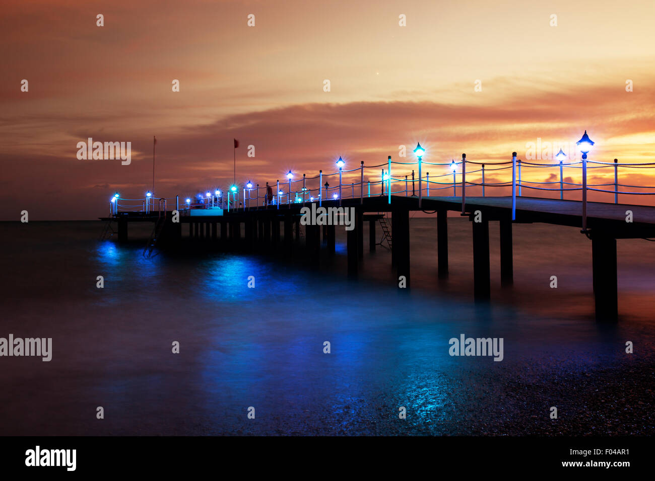 Boat pier at sunset. Beautiful landscape Stock Photo - Alamy