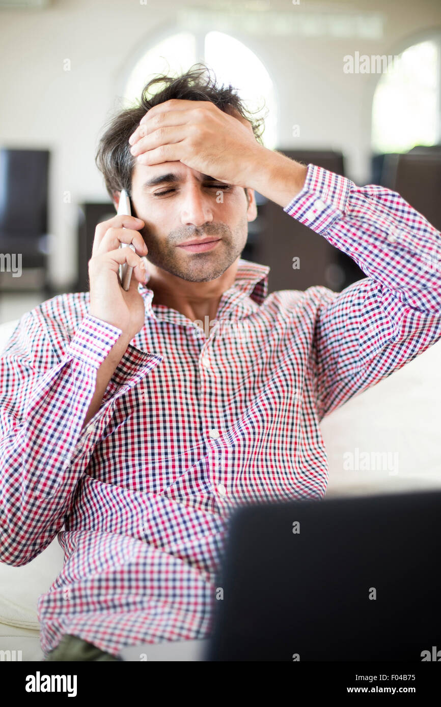 Handsome young man on the mobile phone Stock Photo - Alamy