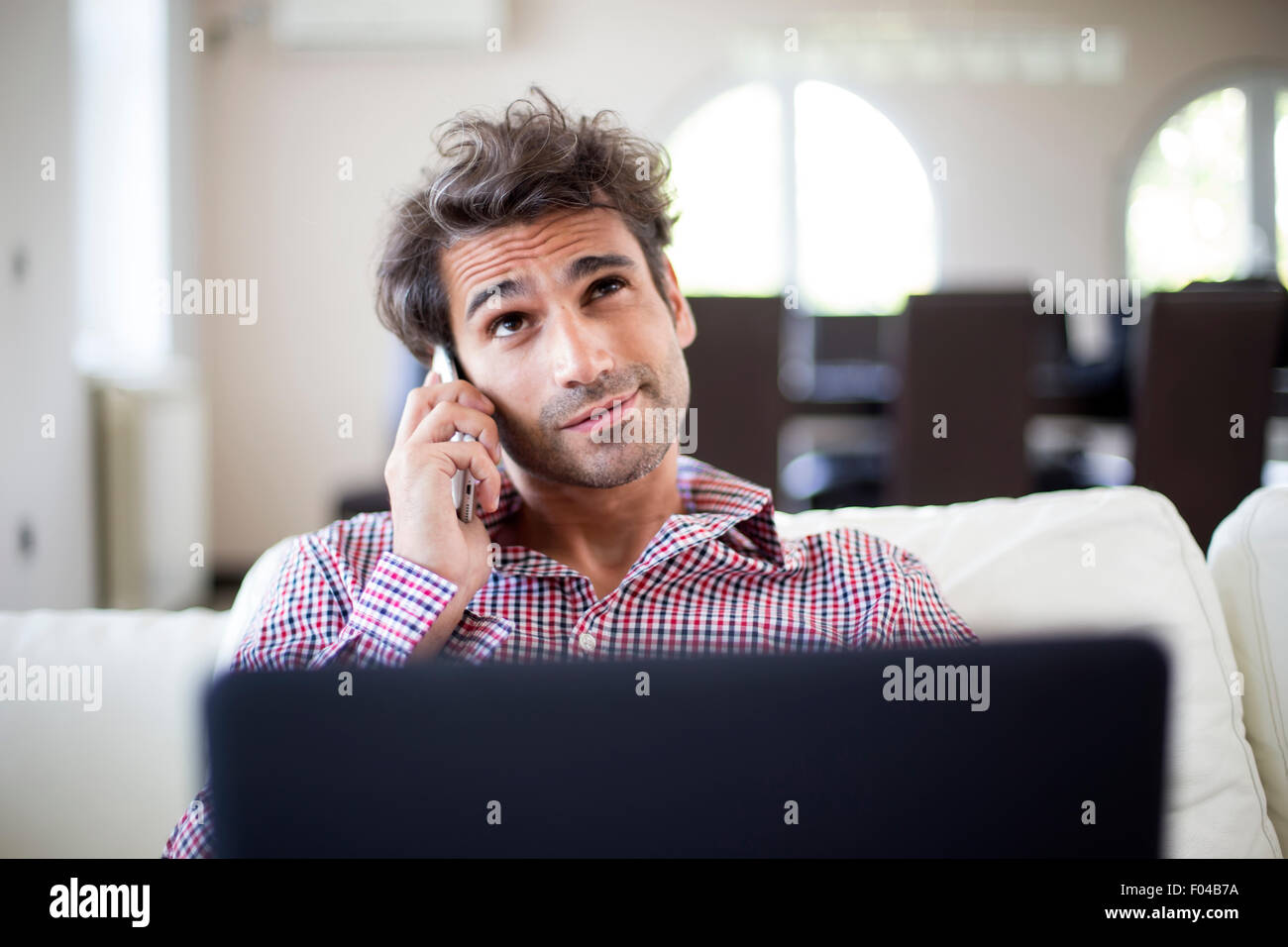 Busy handsome young man hi-res stock photography and images - Alamy