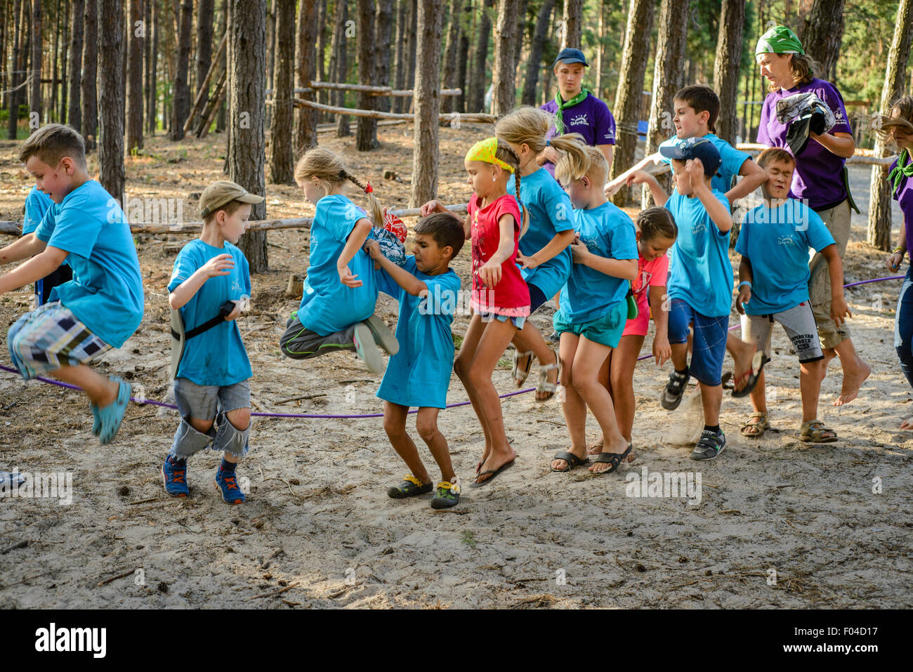 Group boys in scout camp hi-res stock photography and images - Alamy