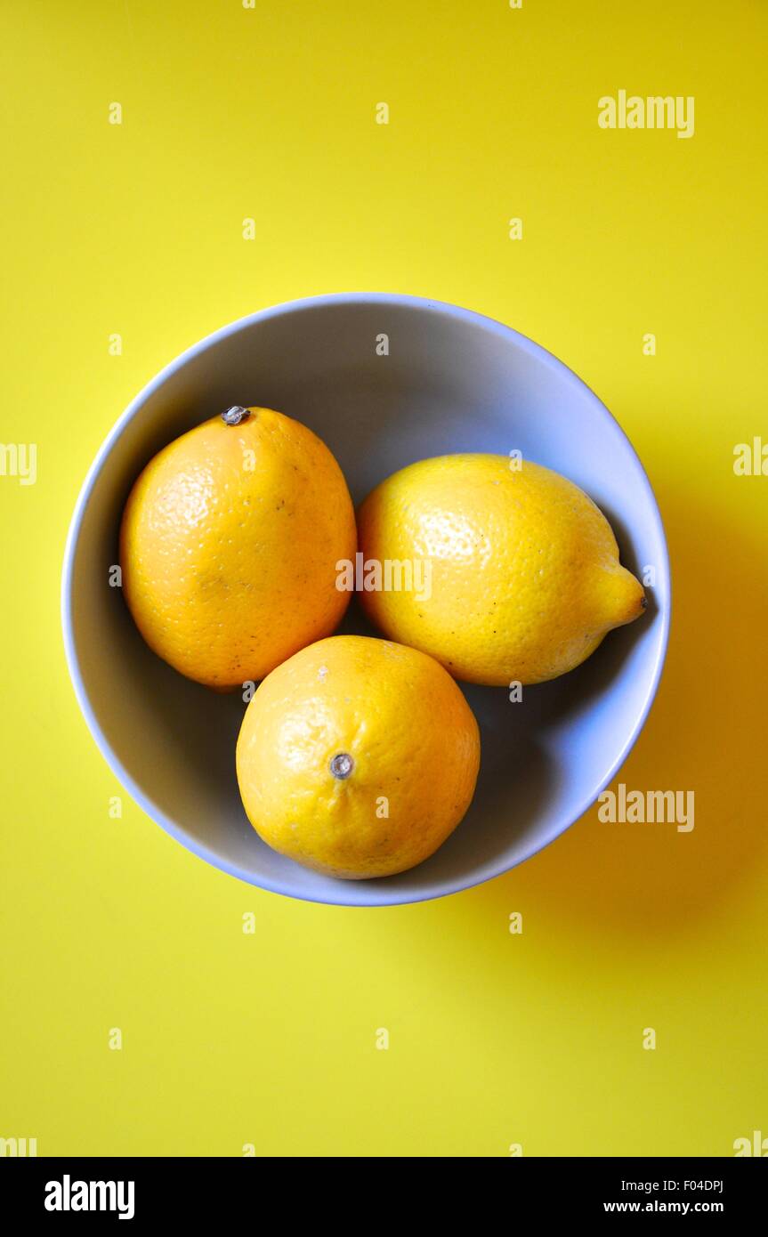 Three lemons in a bowl hi-res stock photography and images - Alamy