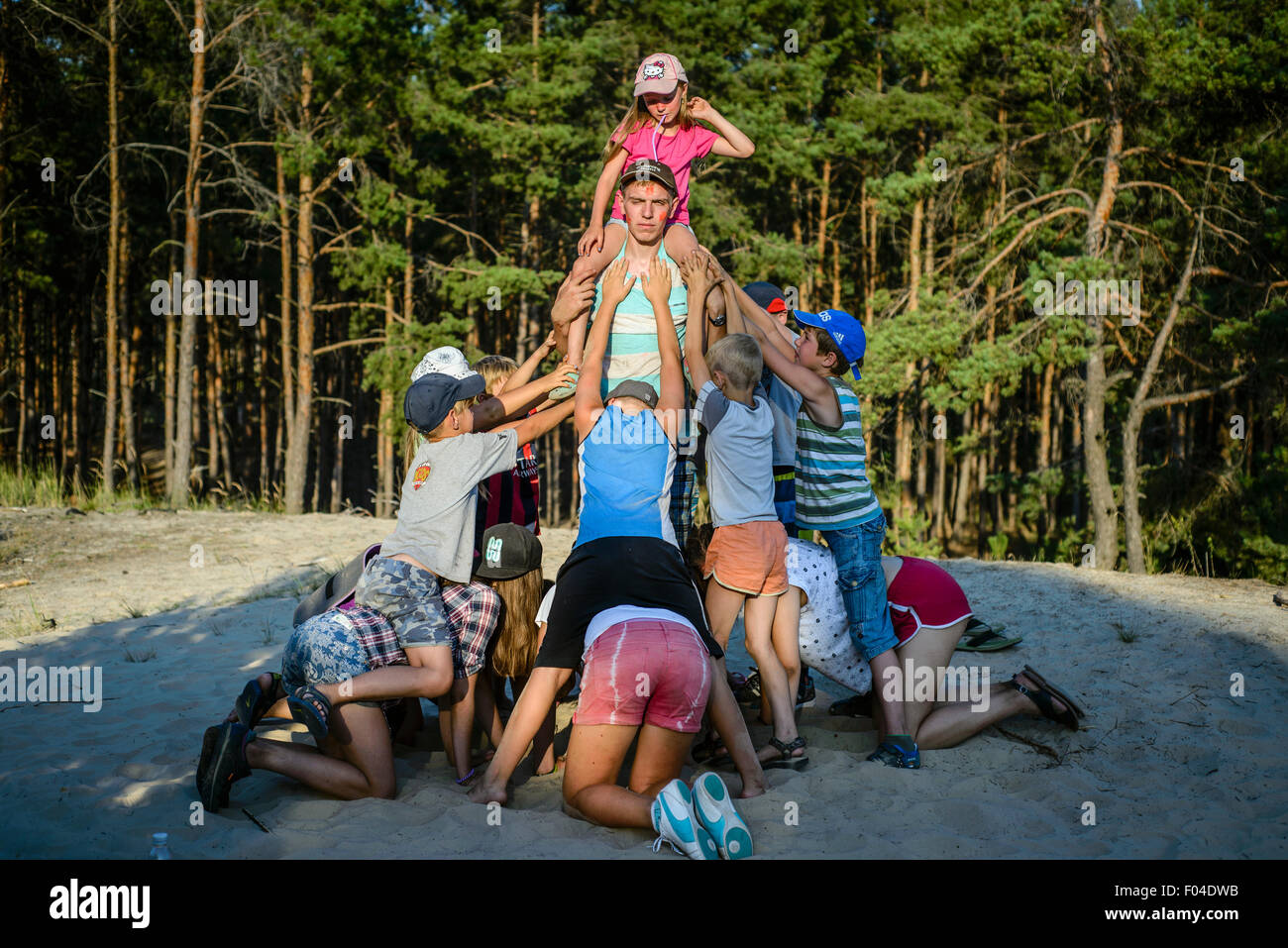 Group boys in scout camp hi-res stock photography and images - Alamy
