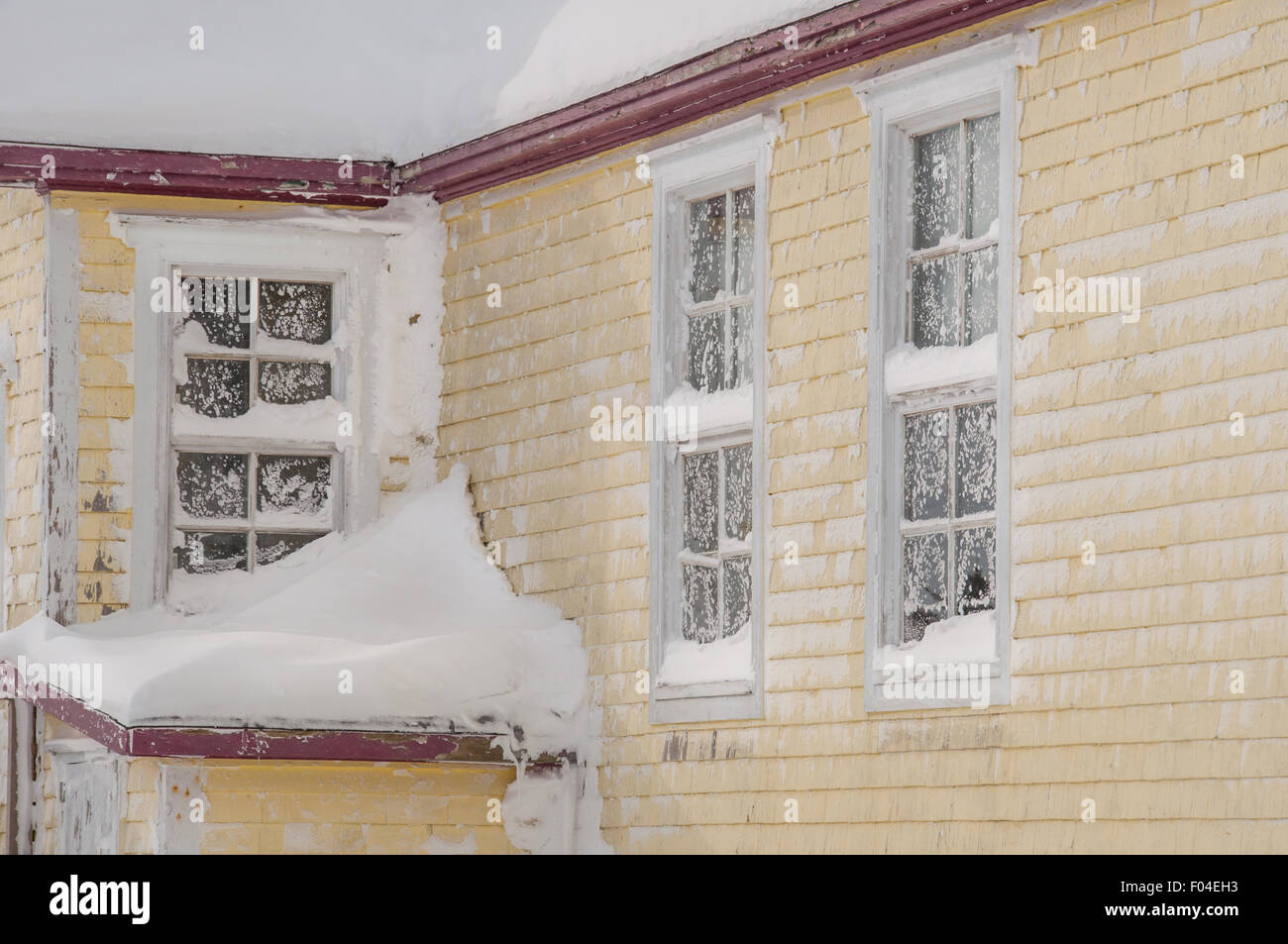 thin ice coating on the yellow home Stock Photo - Alamy
