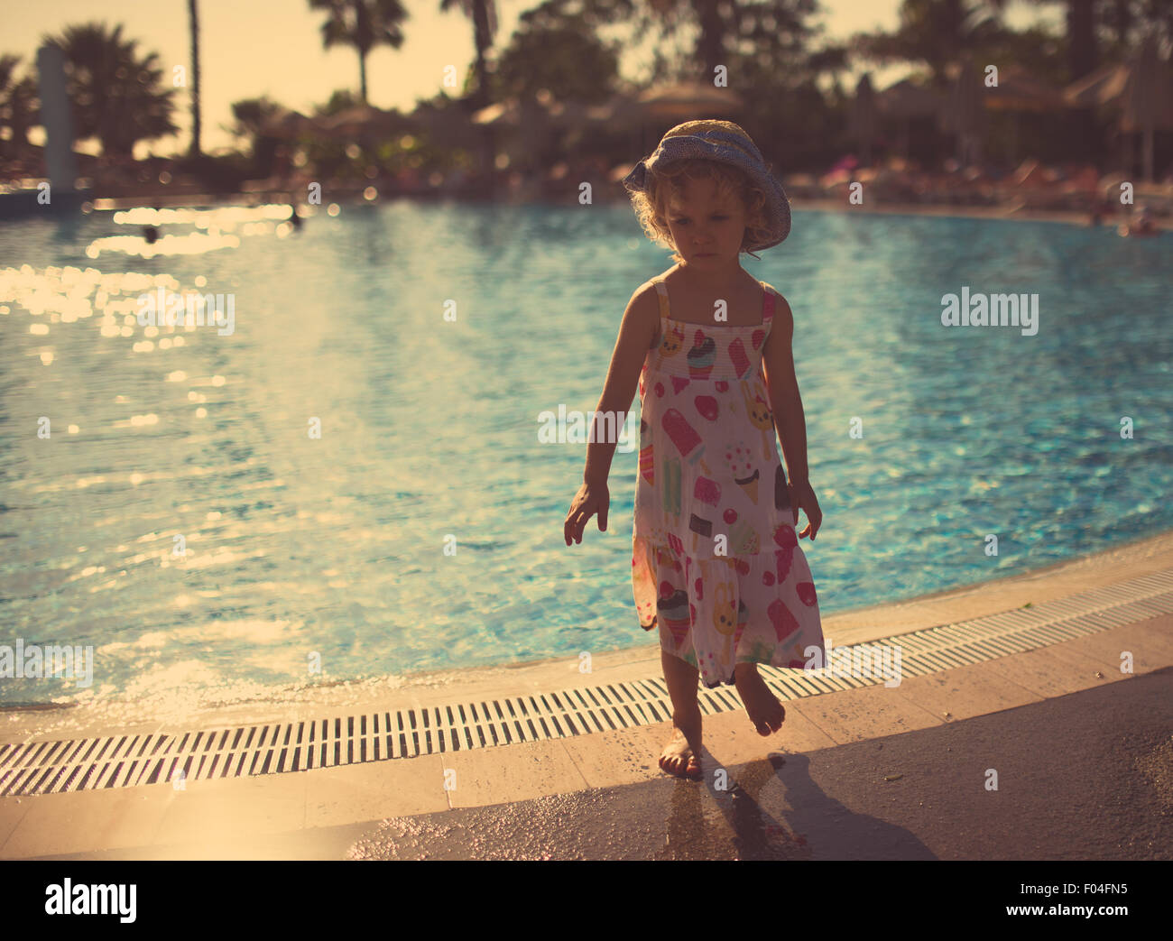 Little girl in swimming pool. Summer outdoor Stock Photo - Alamy