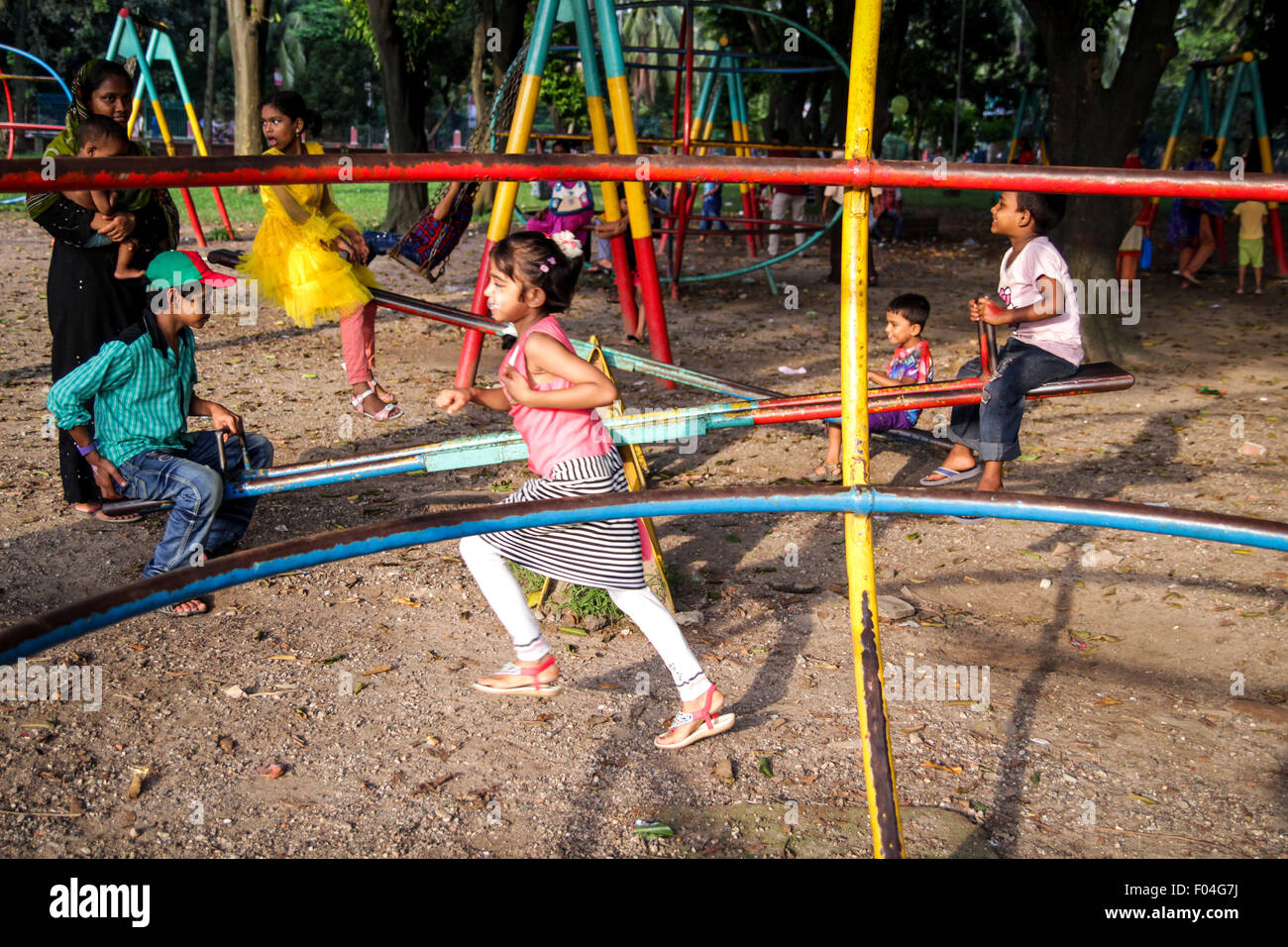 Dhaka, Bangladesh. 06th Aug, 2015. A child playing in a park. Parents ...
