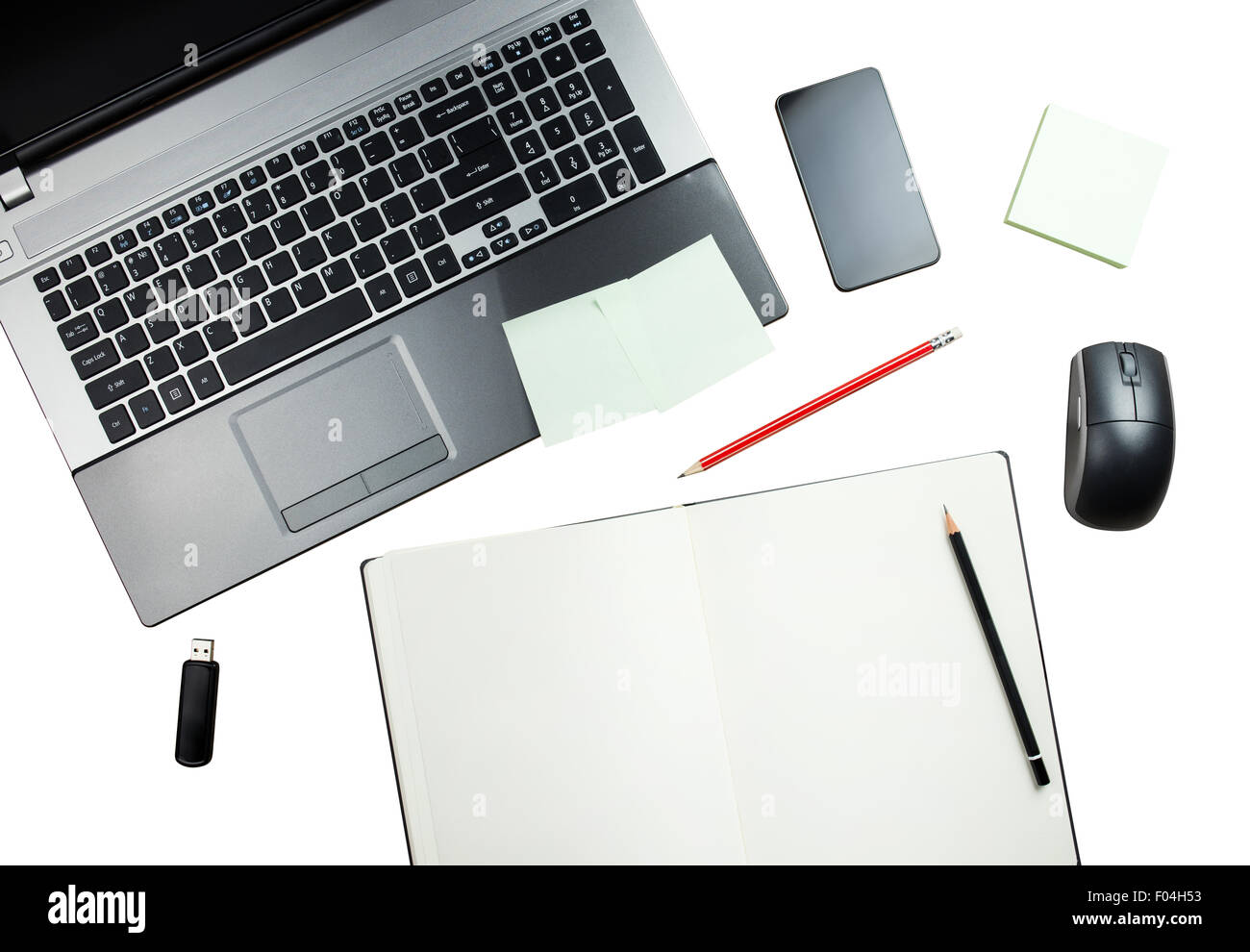 Workplace, laptop and notepad with pencils isolated on white background ...