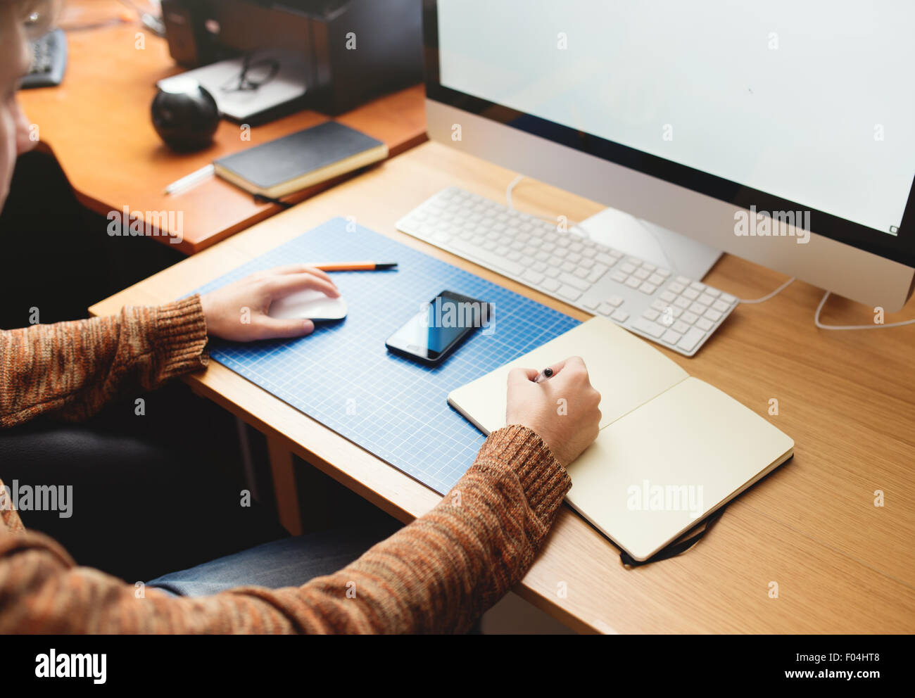 Freelance developer and designer working at home, man writing in ...