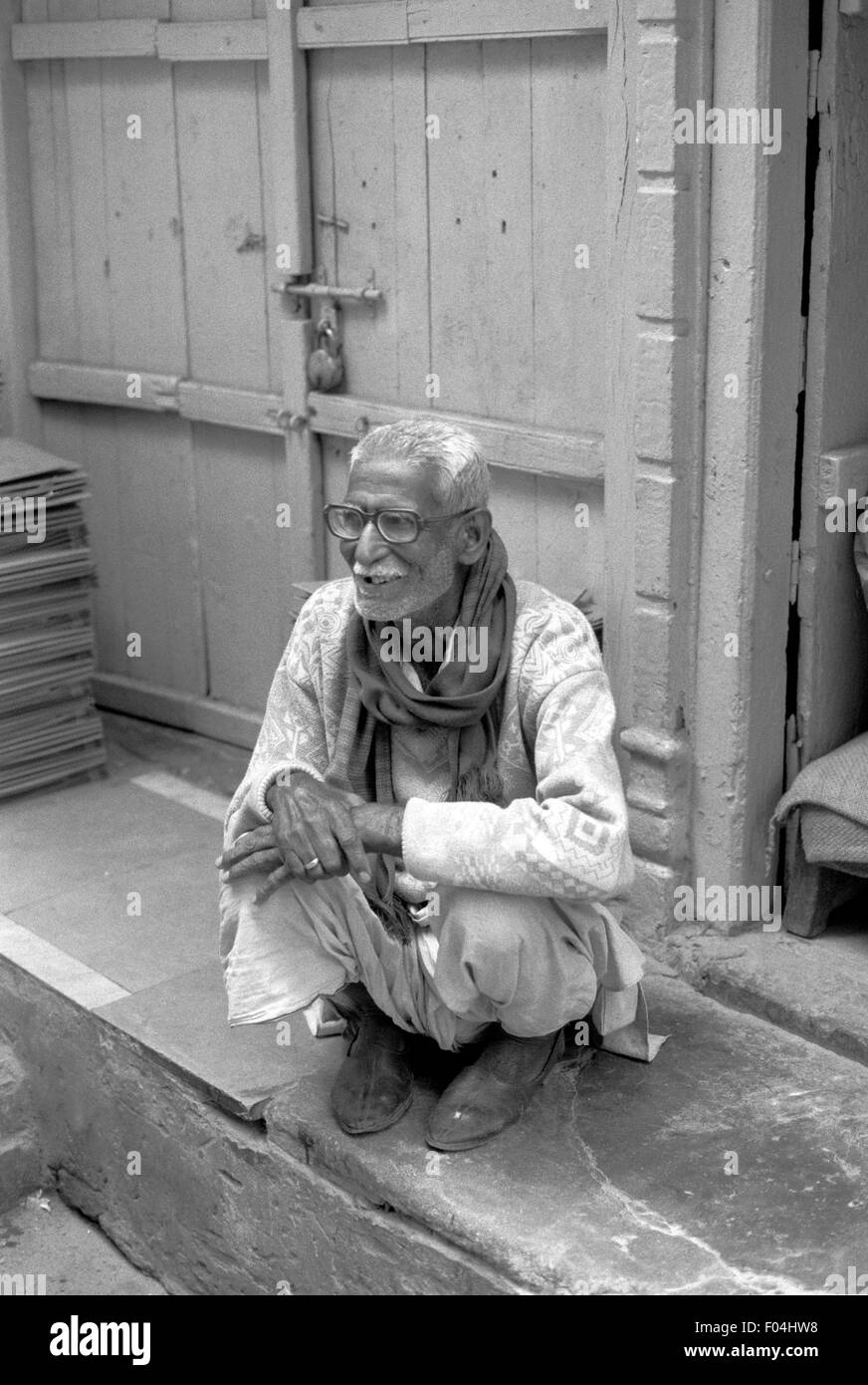 indian man sitting brian mcguire Stock Photo - Alamy