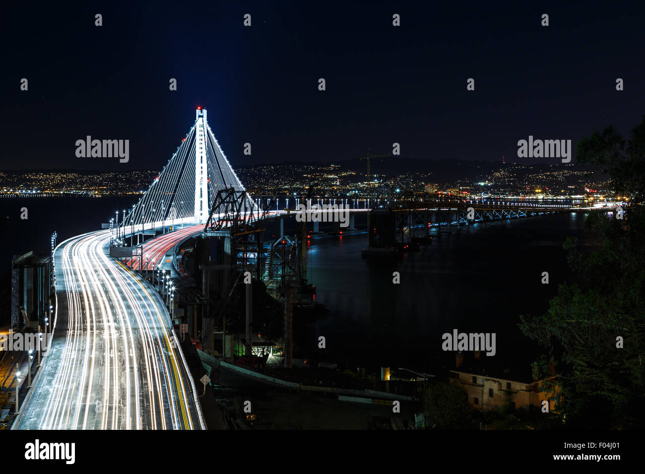 New span of the San Francisco-Oakland Bay Bridge illuminated at night ...