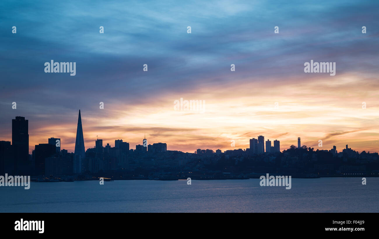 Skyline at sunset with dramatic clouds hi-res stock photography and ...