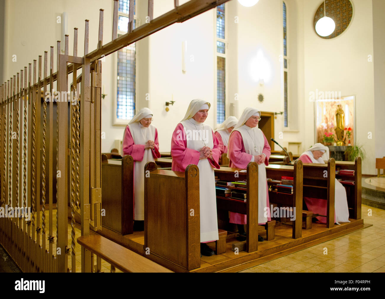 Berlin, Germany. 29th Jan, 2015. Nuns pray in the church at the Kloster ...
