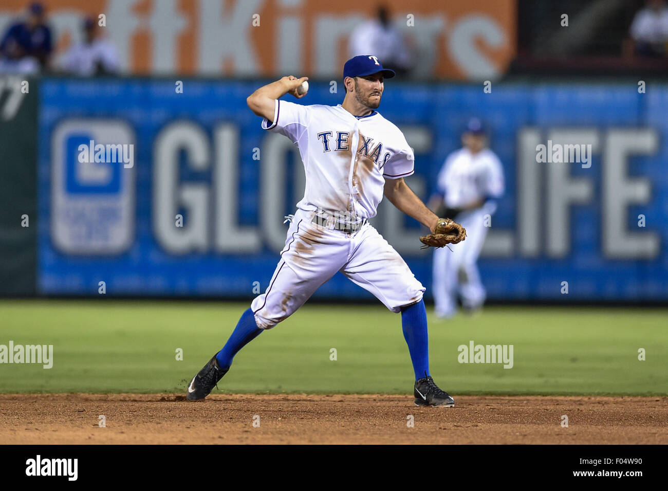 AUG 05, 2015: .Texas Rangers second baseman Adam Rosales (9) throws to ...