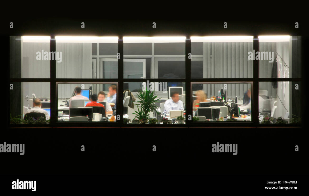 Late office work during deadline Stock Photo - Alamy