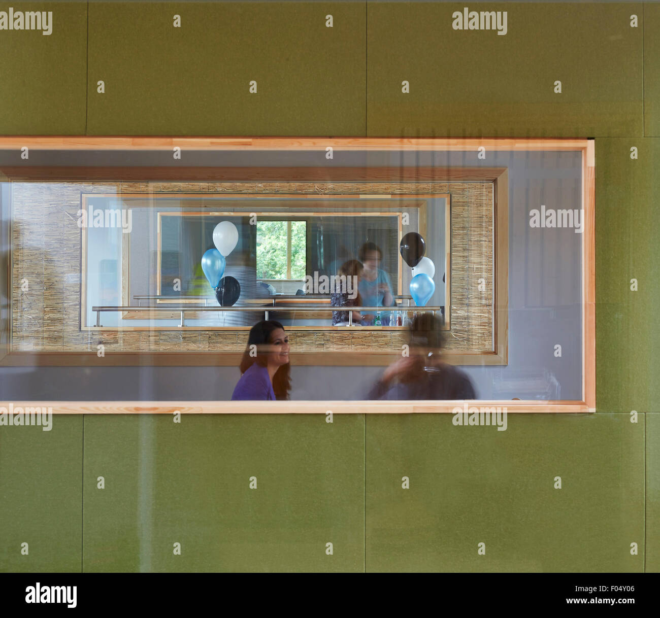 Window void linking office and boardroom space on first floor. The ...