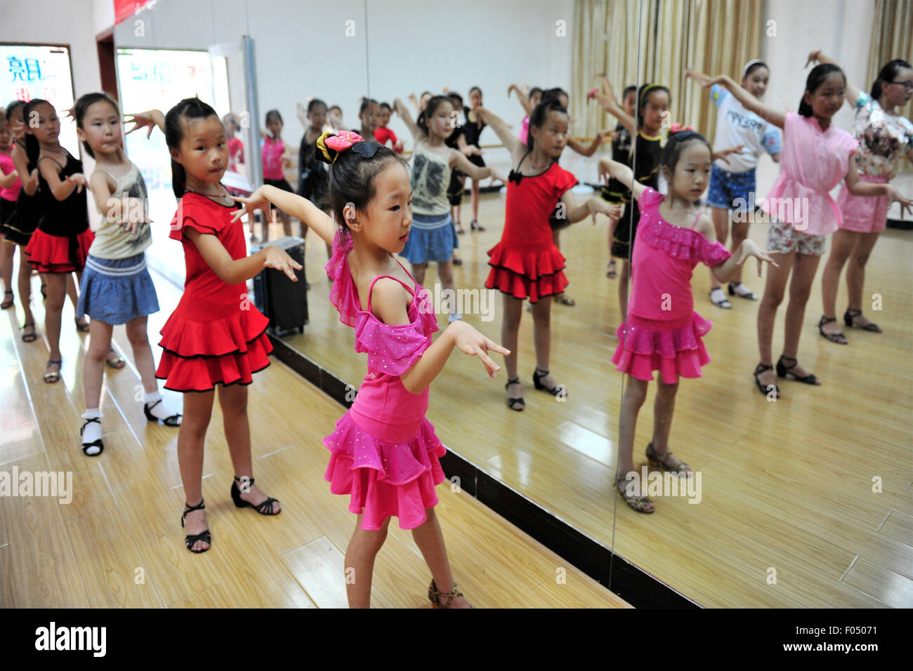 Yichang, China's Hubei Province. 6th Aug, 2015. Children dance at the ...