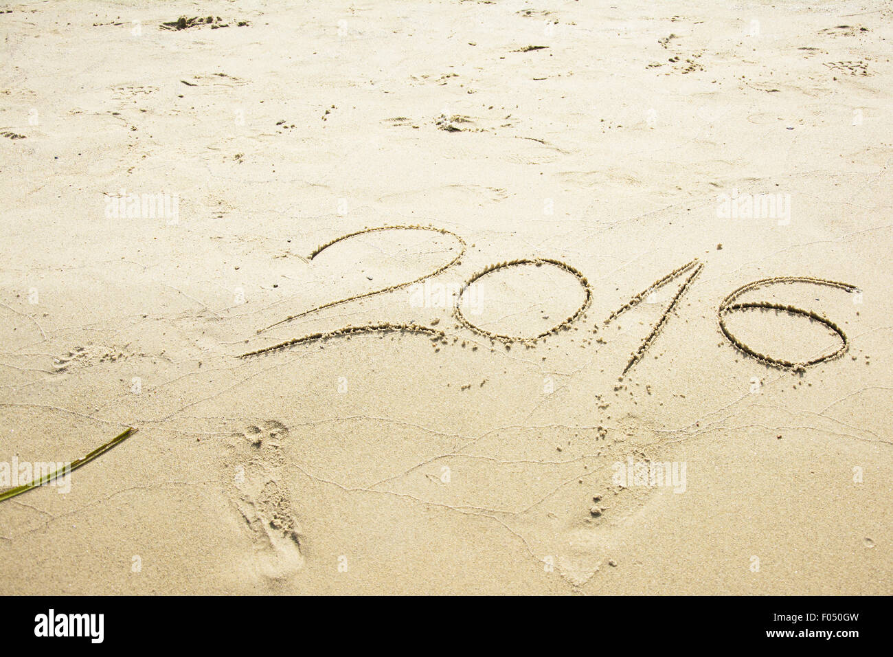 Numbers written on sand hi-res stock photography and images - Alamy