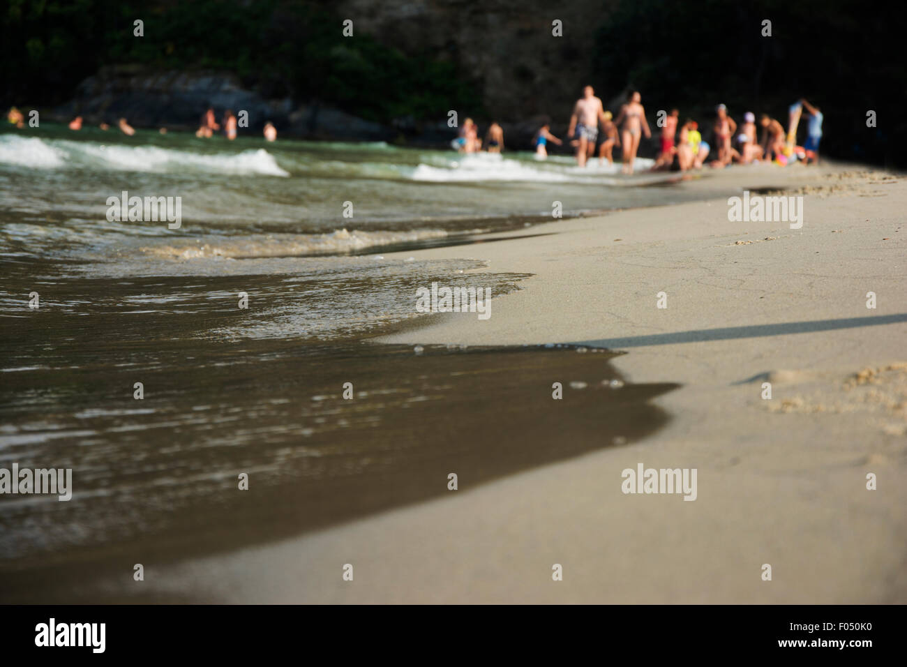 Huge sandy beach with its constant waves and long shallow waters ...