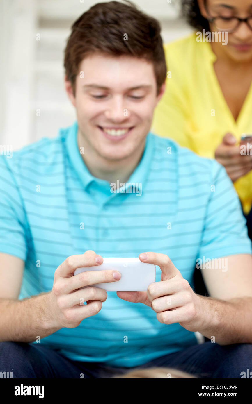 close up of young man with smartphone Stock Photo - Alamy