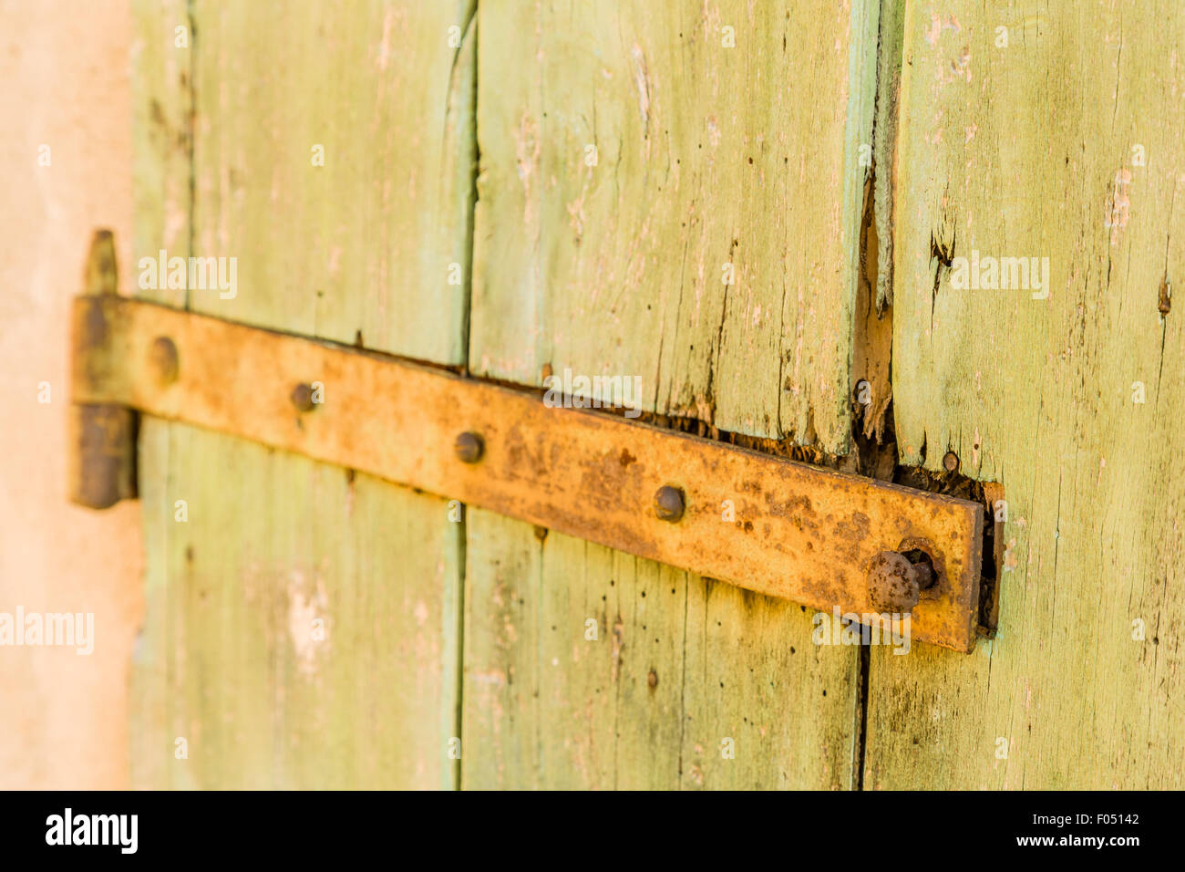 rusty hinge of an old wooden door of an old country barn Stock Photo ...