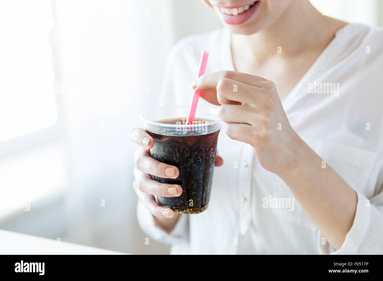 People drinking coke hi-res stock photography and images - Alamy