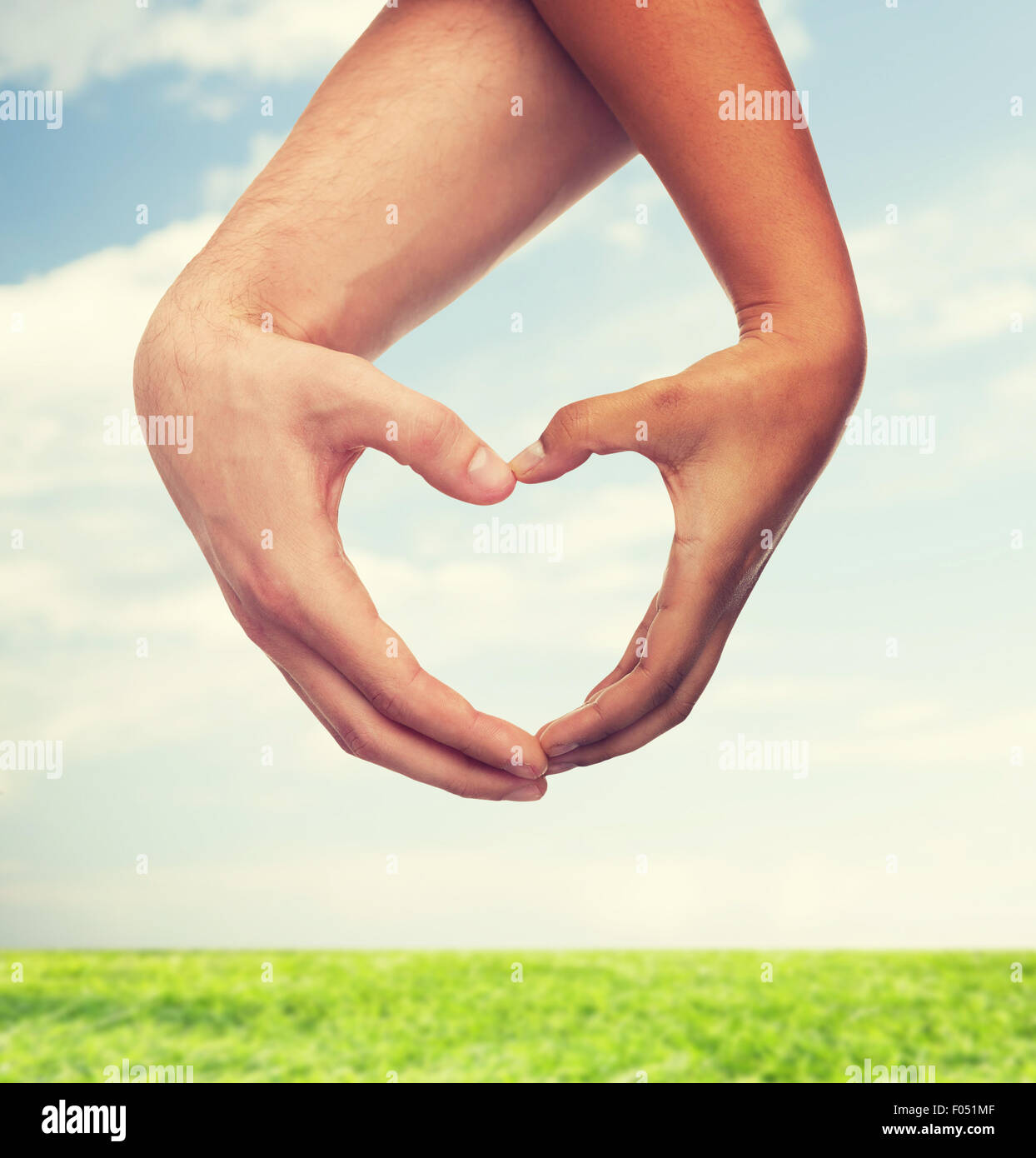 Heart shape man hands hi-res stock photography and images - Alamy