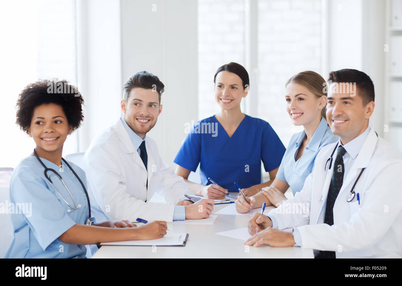 group of happy doctors meeting at hospital office Stock Photo - Alamy
