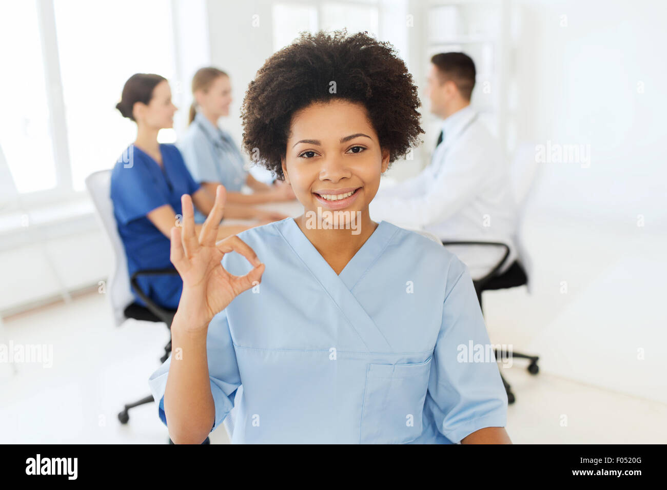 doctor or nurse showing ok hand sign at hospital Stock Photo - Alamy