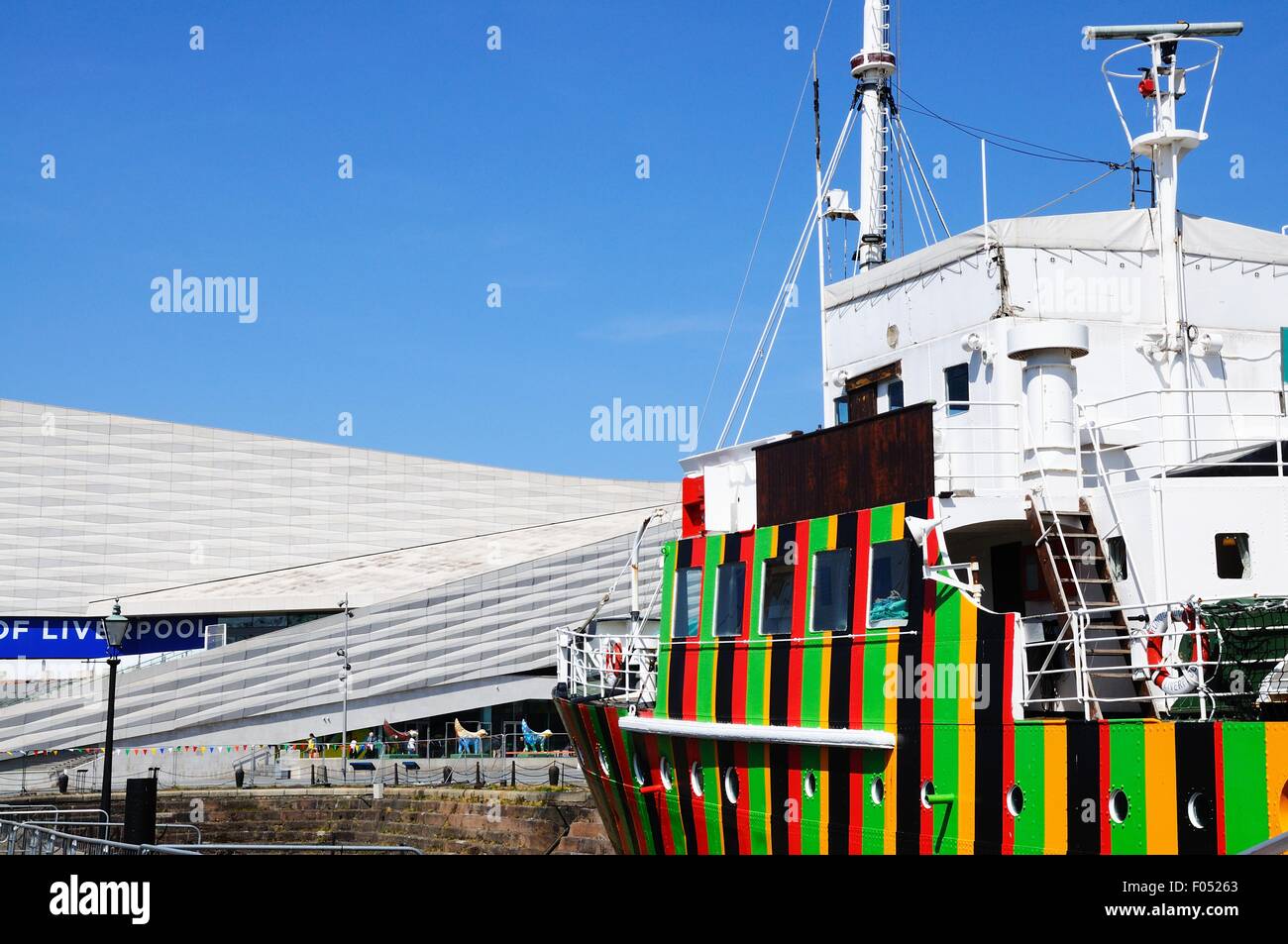 The Dazzle Ship in Canning Dock with the Museum of Liverpool to the ...