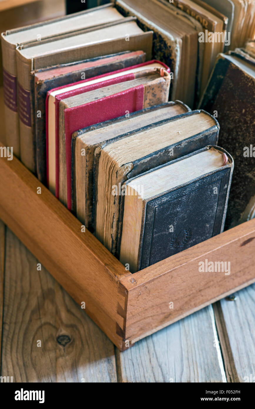 Old books in the wooden box Stock Photo - Alamy