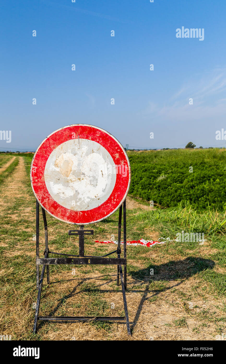 traffic signs and country roads - a faded speed limit 30 mph sign ...