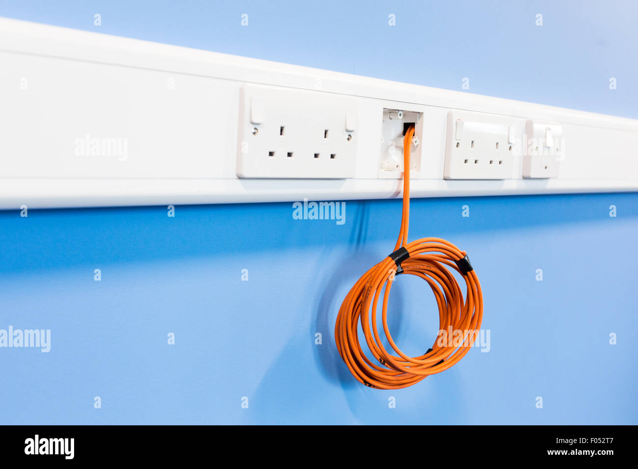 Plug socket and and ISDN cable Stock Photo - Alamy
