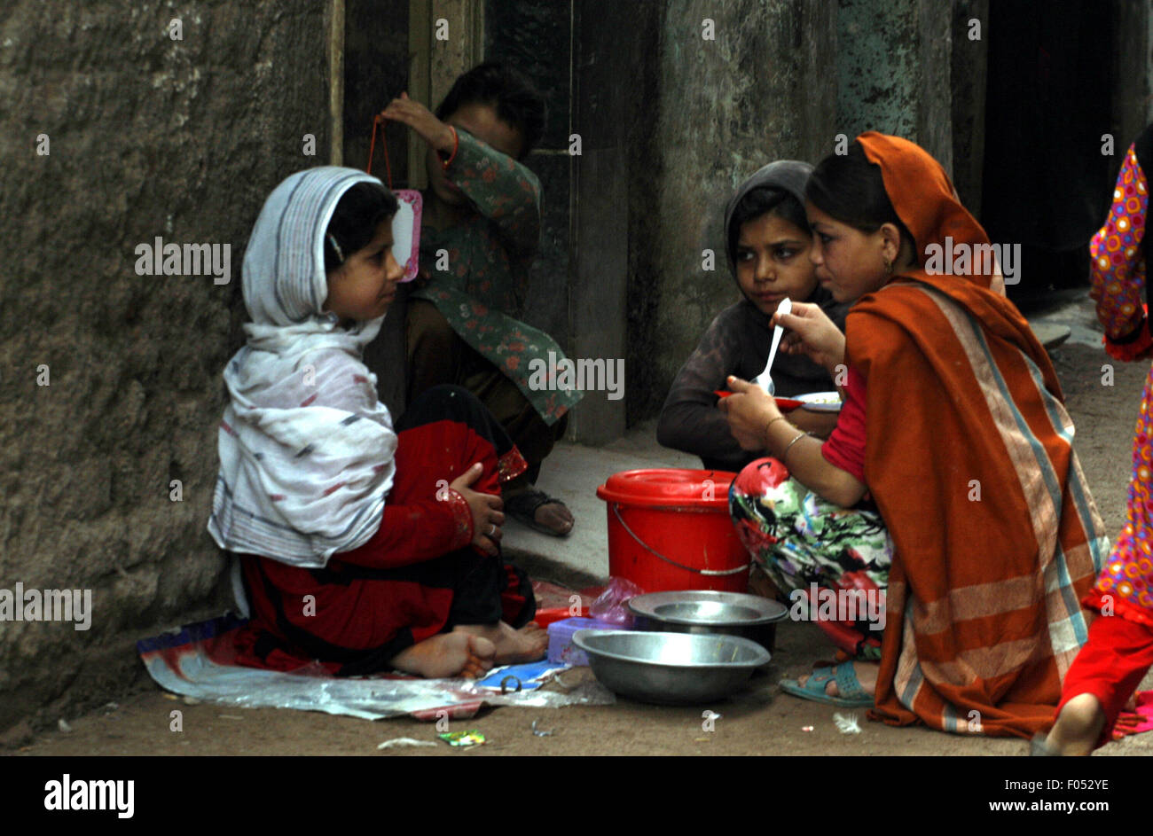 Afghan refugee children sit hi-res stock photography and images - Alamy