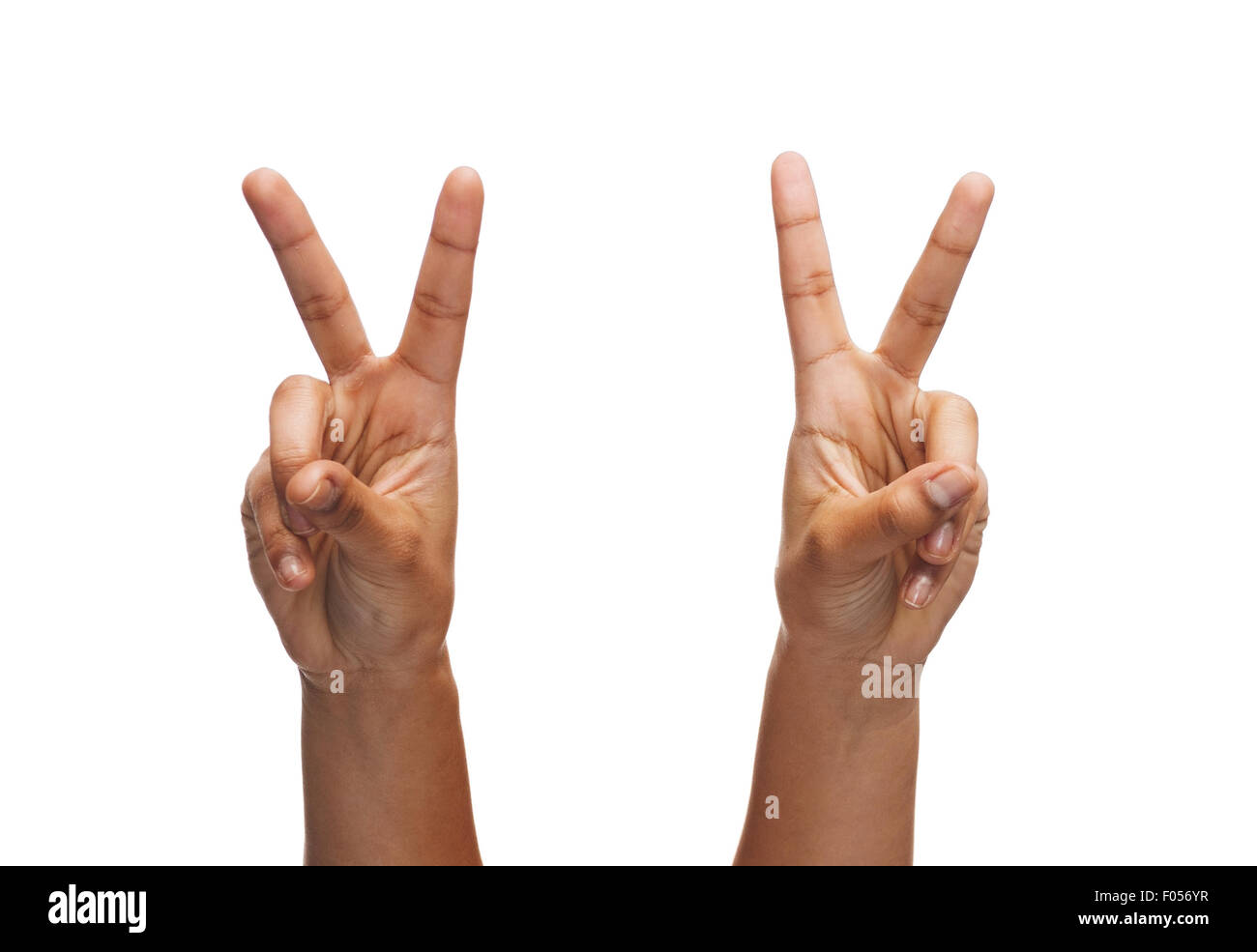woman hands showing v-sign Stock Photo - Alamy