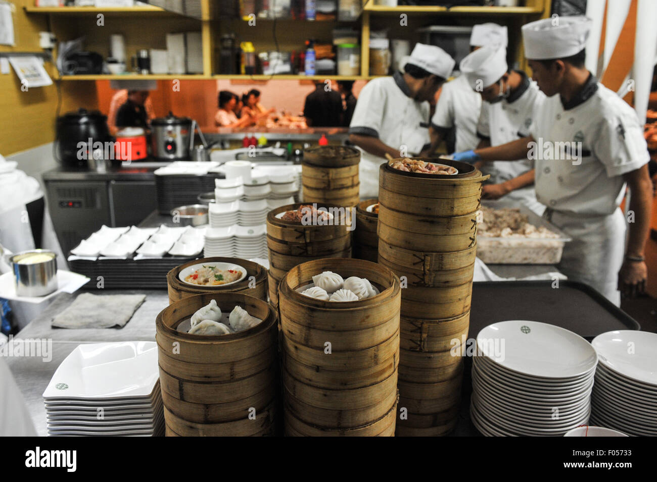 Jakarta, Indonesia. 7th Aug, 2015. Chefs prepare food stuff for Chinese ...