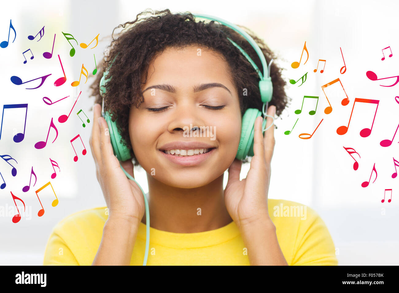 happy woman with headphones listening to music Stock Photo - Alamy