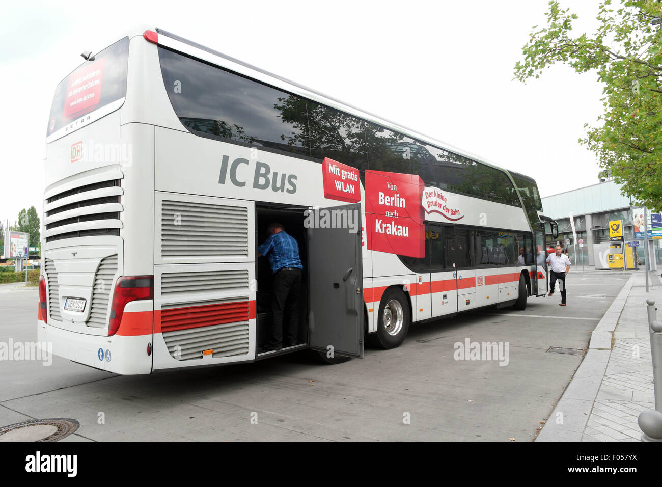Passengers enter an 'IC Bus' at the train station 'Suedkreuz' in Berlin ...