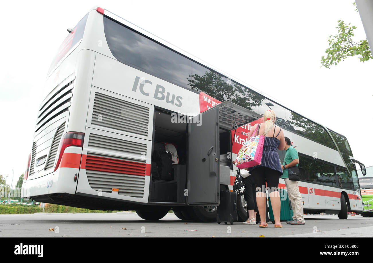 Passengers enter an 'IC Bus' at the train station 'Suedkreuz' in Berlin ...