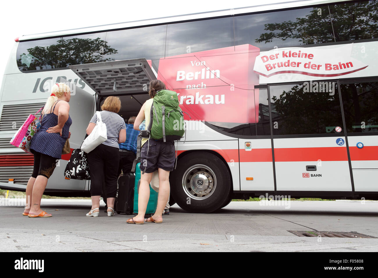 Passengers enter an 'IC Bus' at the train station 'Suedkreuz' in Berlin ...