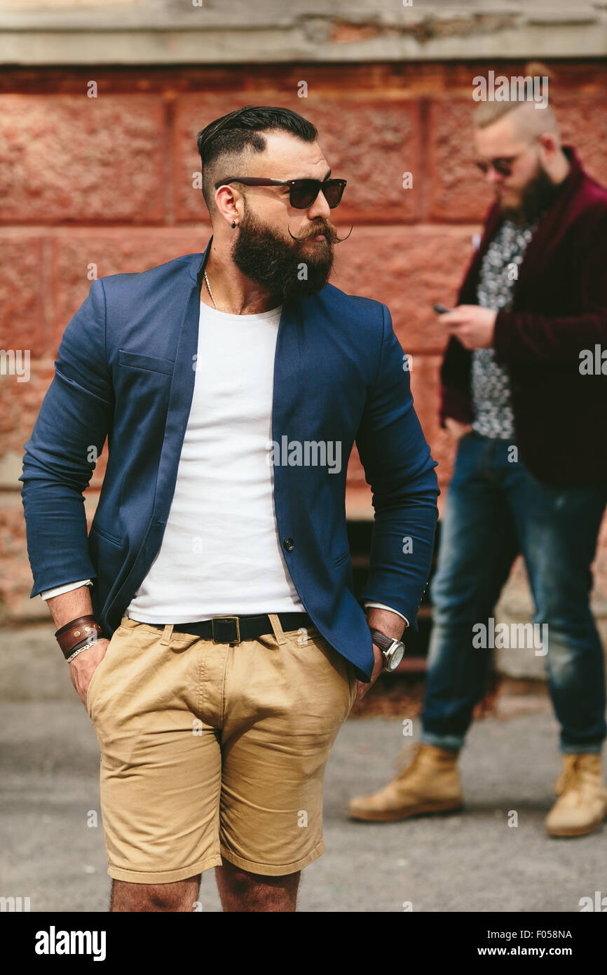 Two stylish bearded men on the background of the old town Stock Photo ...