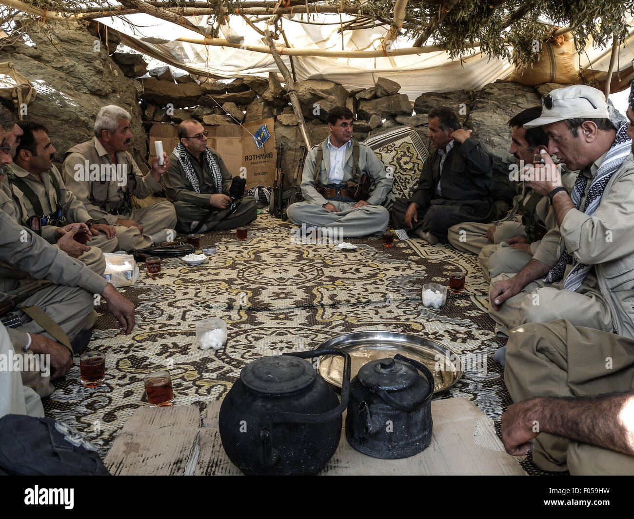 Arbil, Iraq. 07th Aug, 2015. PDKI members drinking milk together in the ...