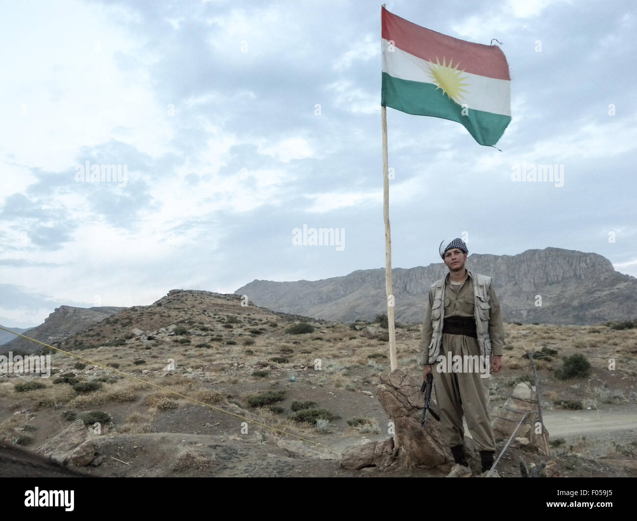 Iran flag on flag pole hi-res stock photography and images - Alamy