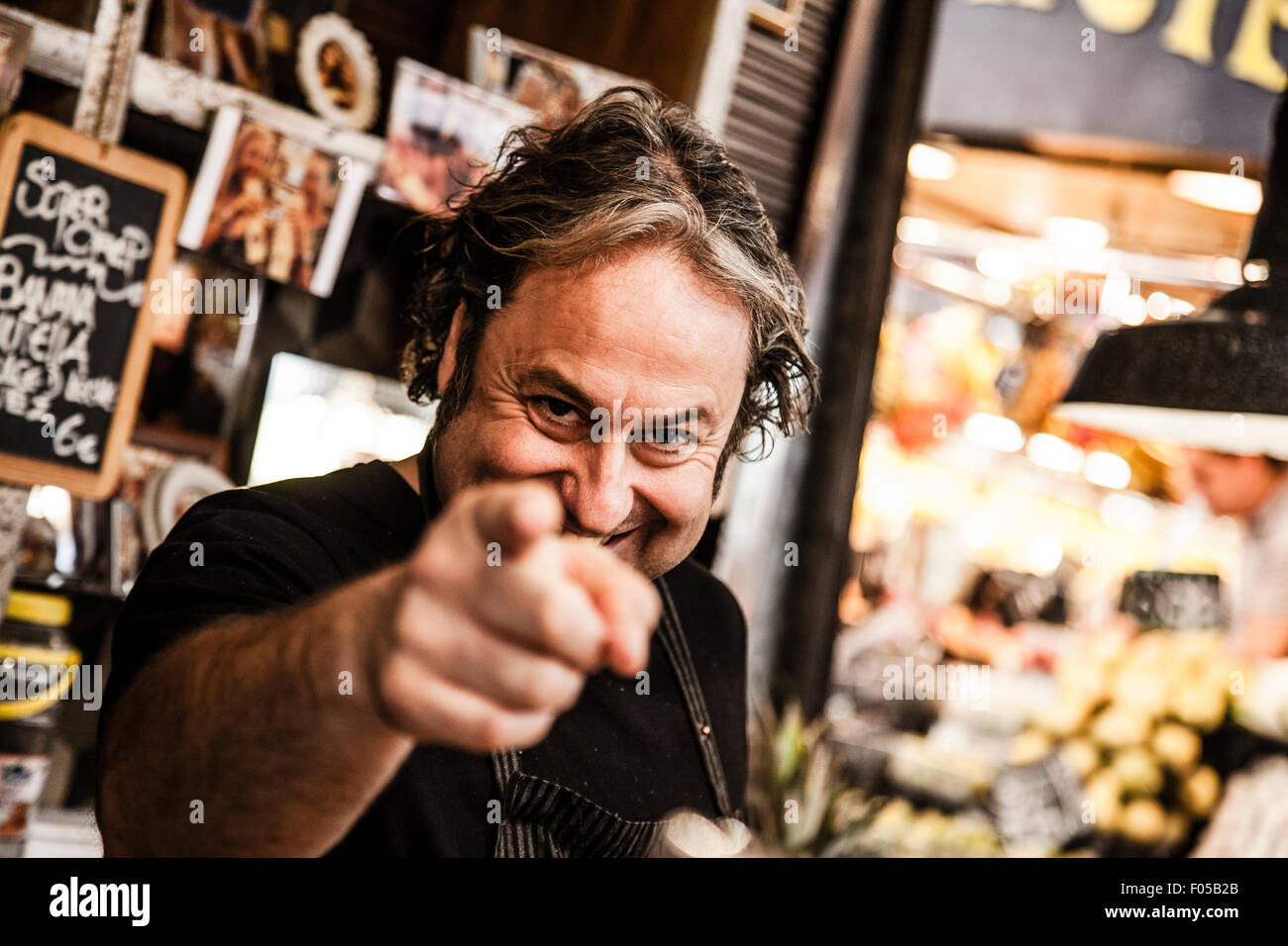 Man sells and prepare crepes at La boqueria, Barcelona Stock Photo - Alamy