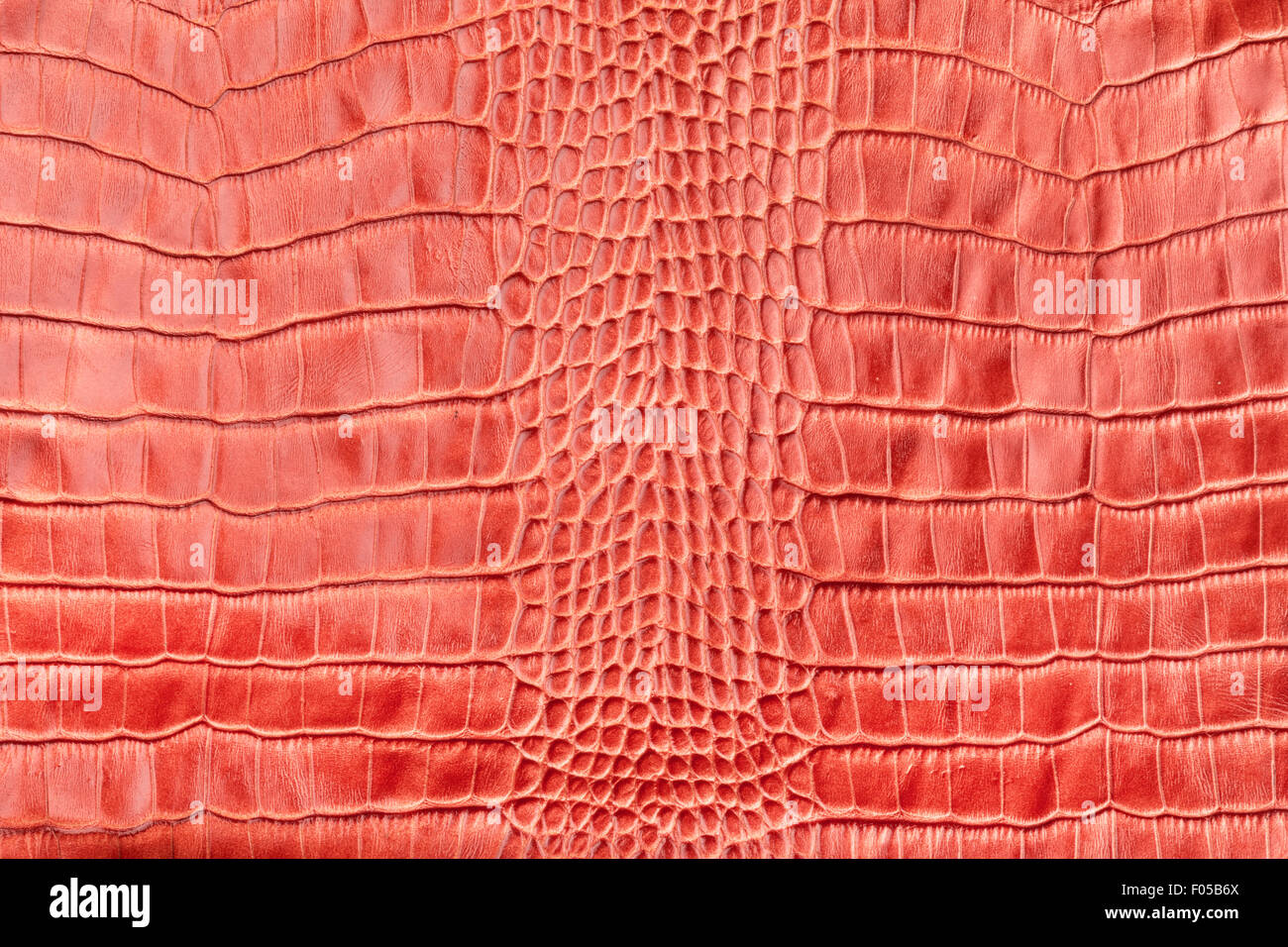 Red crocodile leather, as a background, texture Stock Photo - Alamy