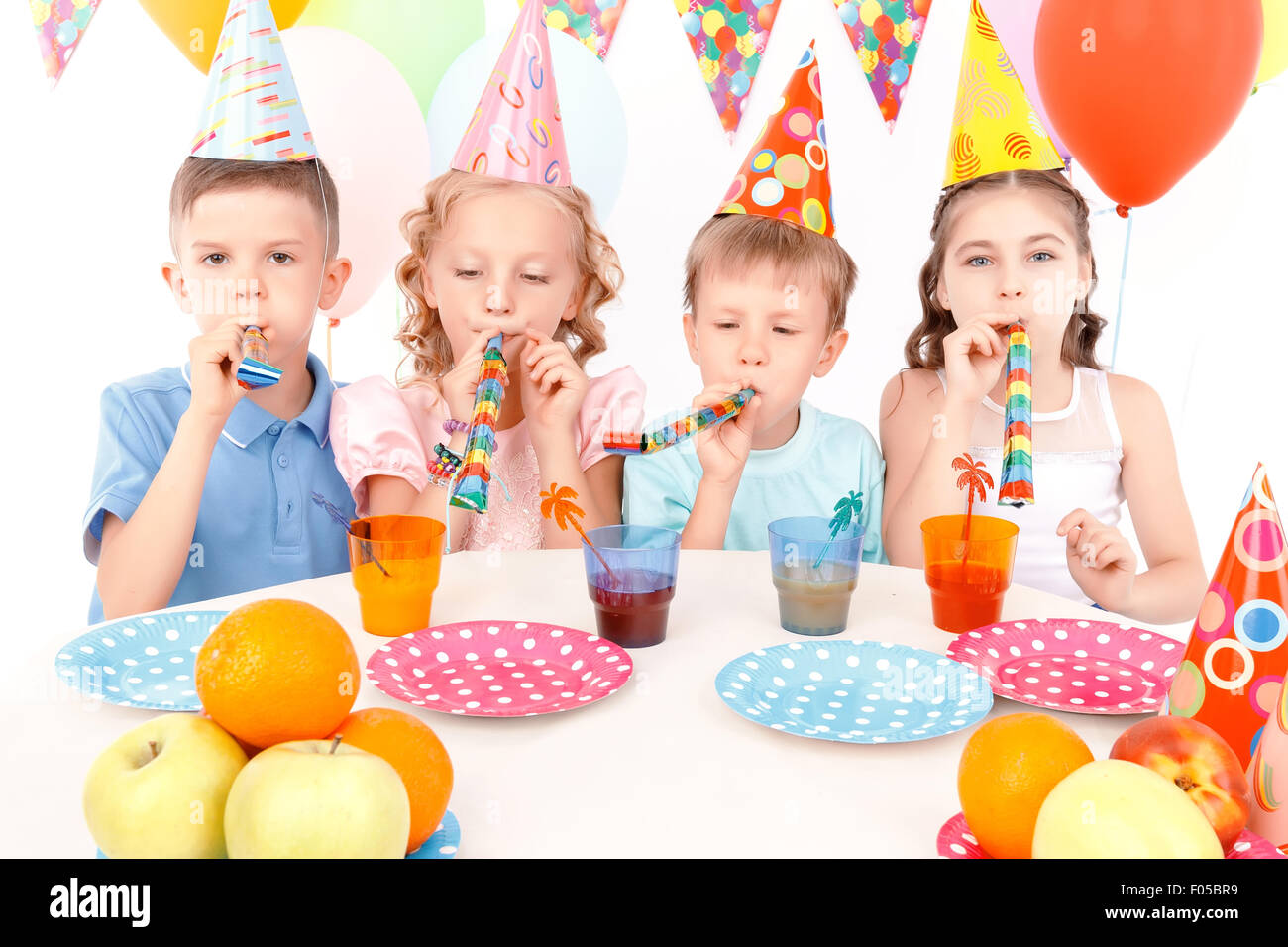 Little children during birthday party Stock Photo - Alamy