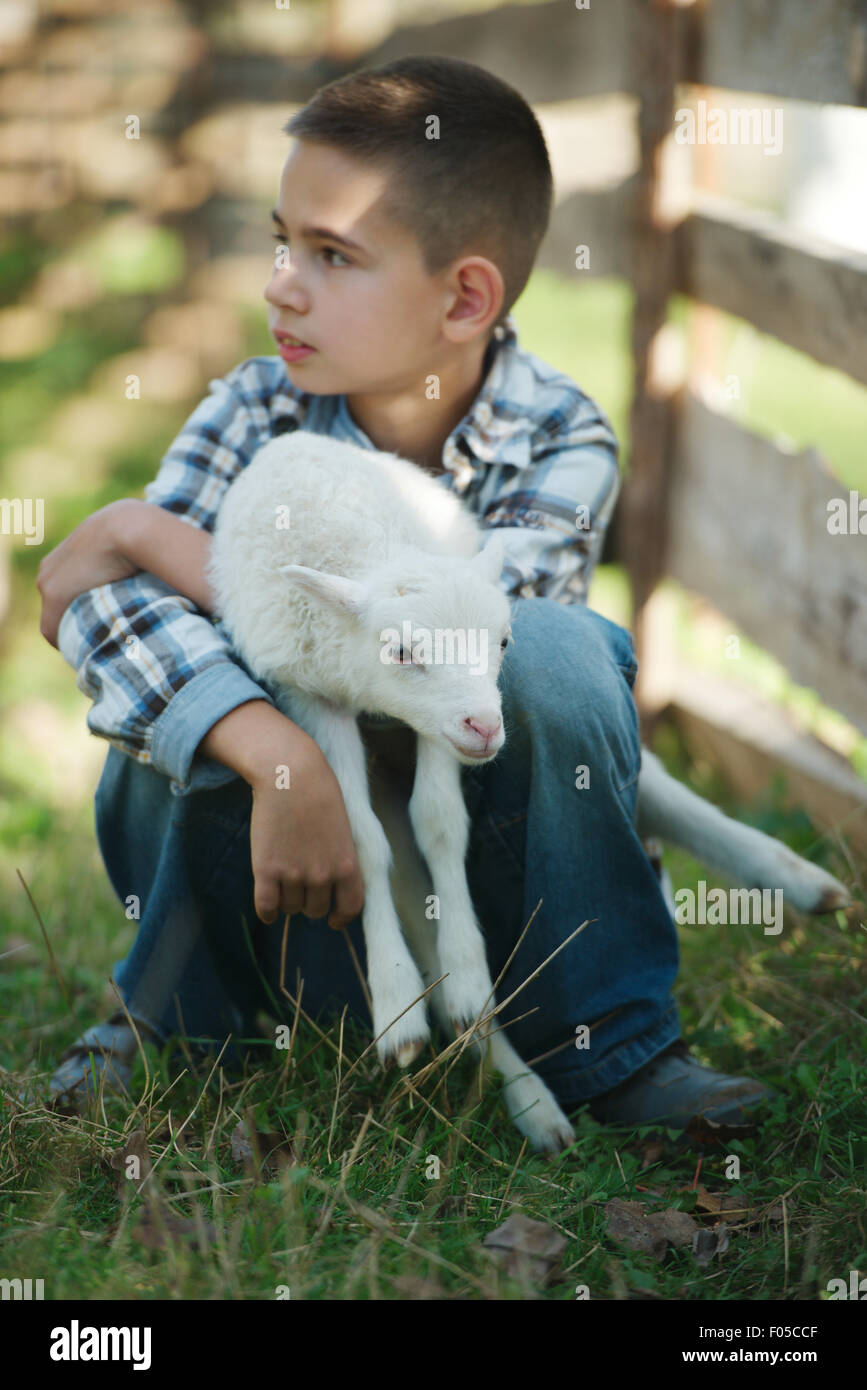 Children hug animals hi-res stock photography and images - Alamy