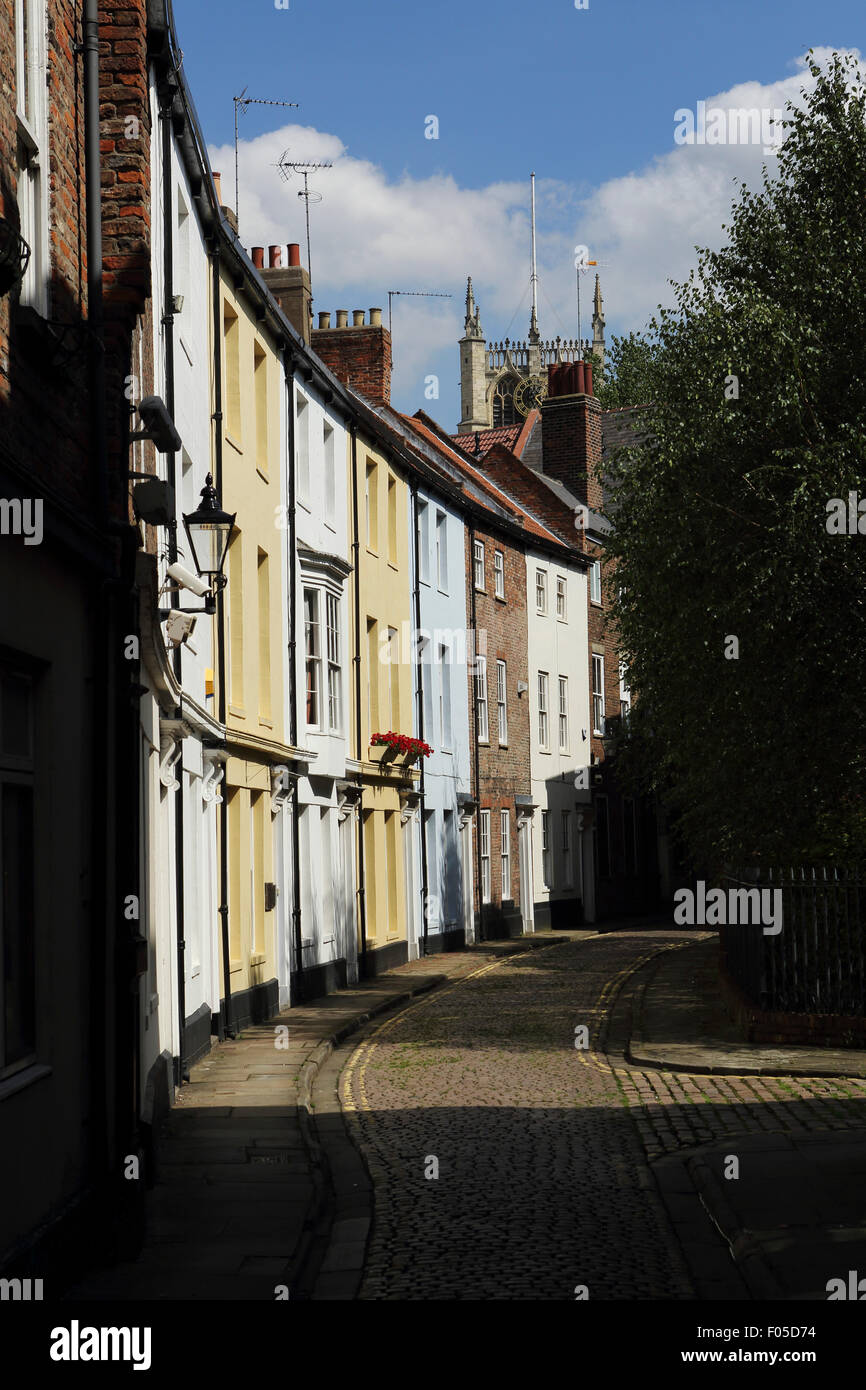 A crescent of pastel coloured Georgian houses in Hull, England. The ...