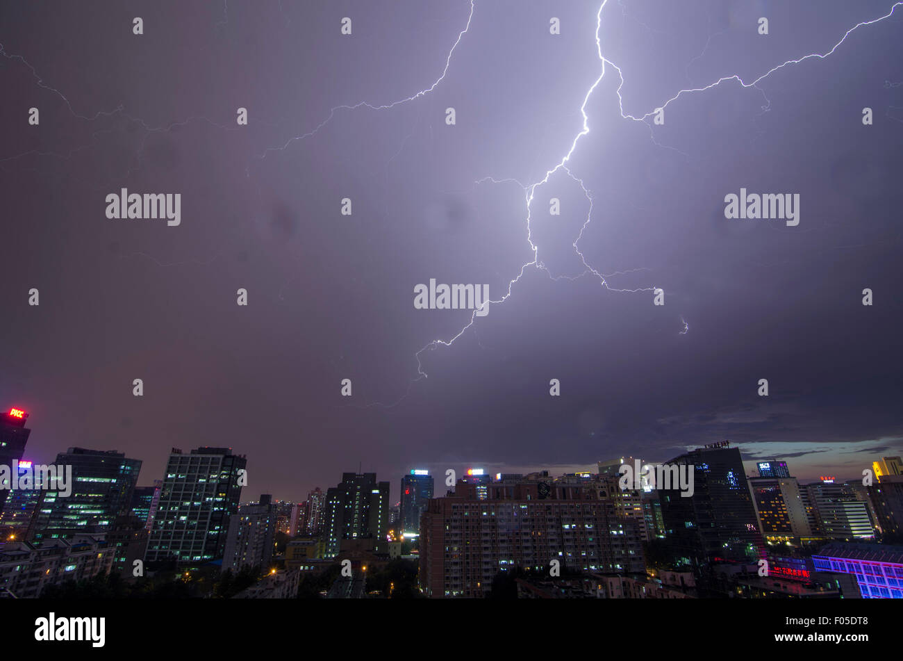 The sky is engulfed in lightning flashes and bolts criss-crossing the ...